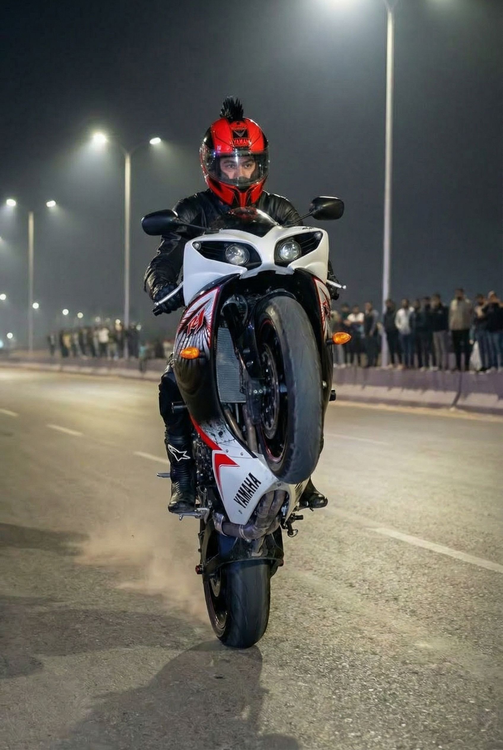 Nano Banana prompt: Wheelie vertically at the uploaded hi...