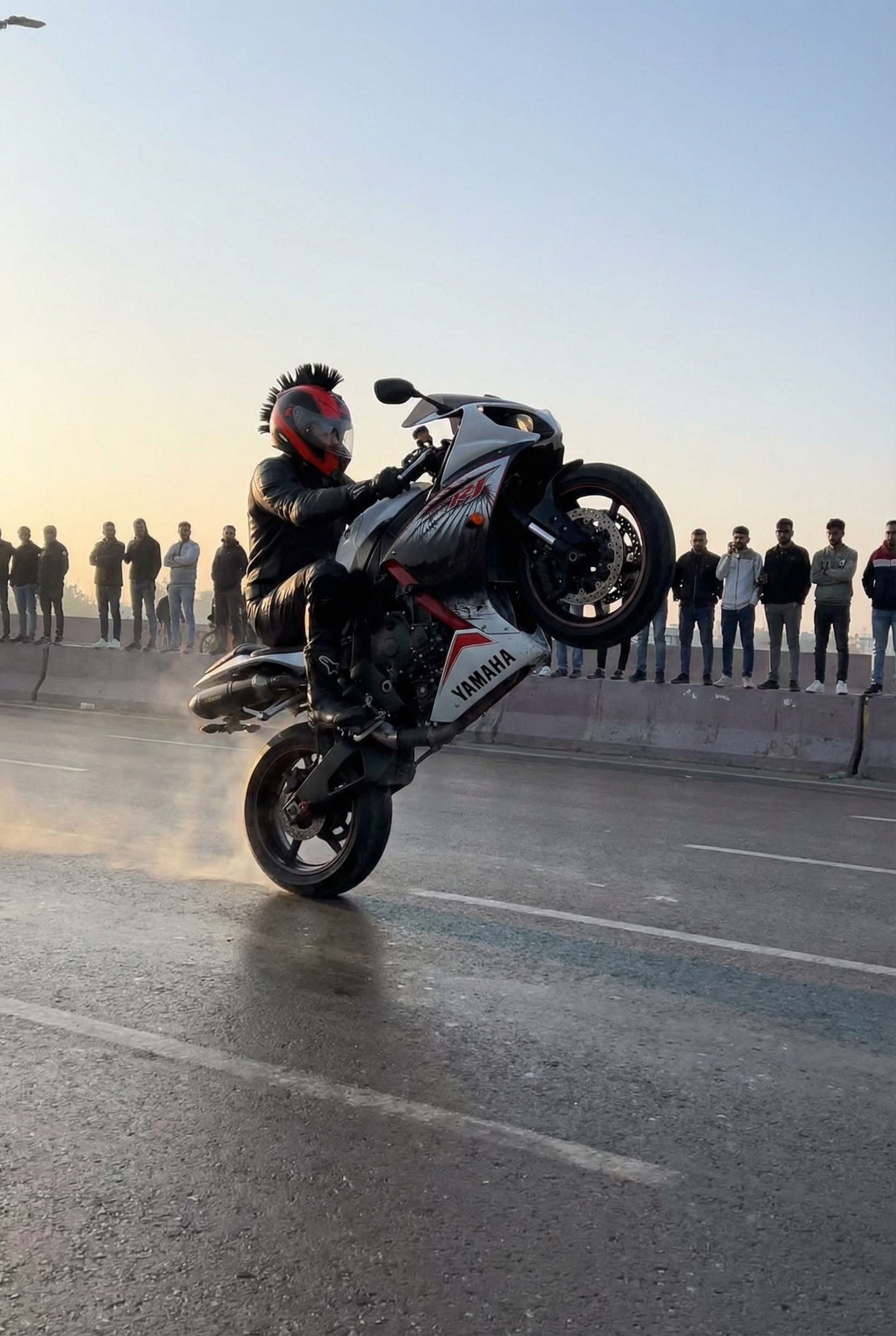 Nano Banana prompt: Wheelie at the uploaded highway, morn...