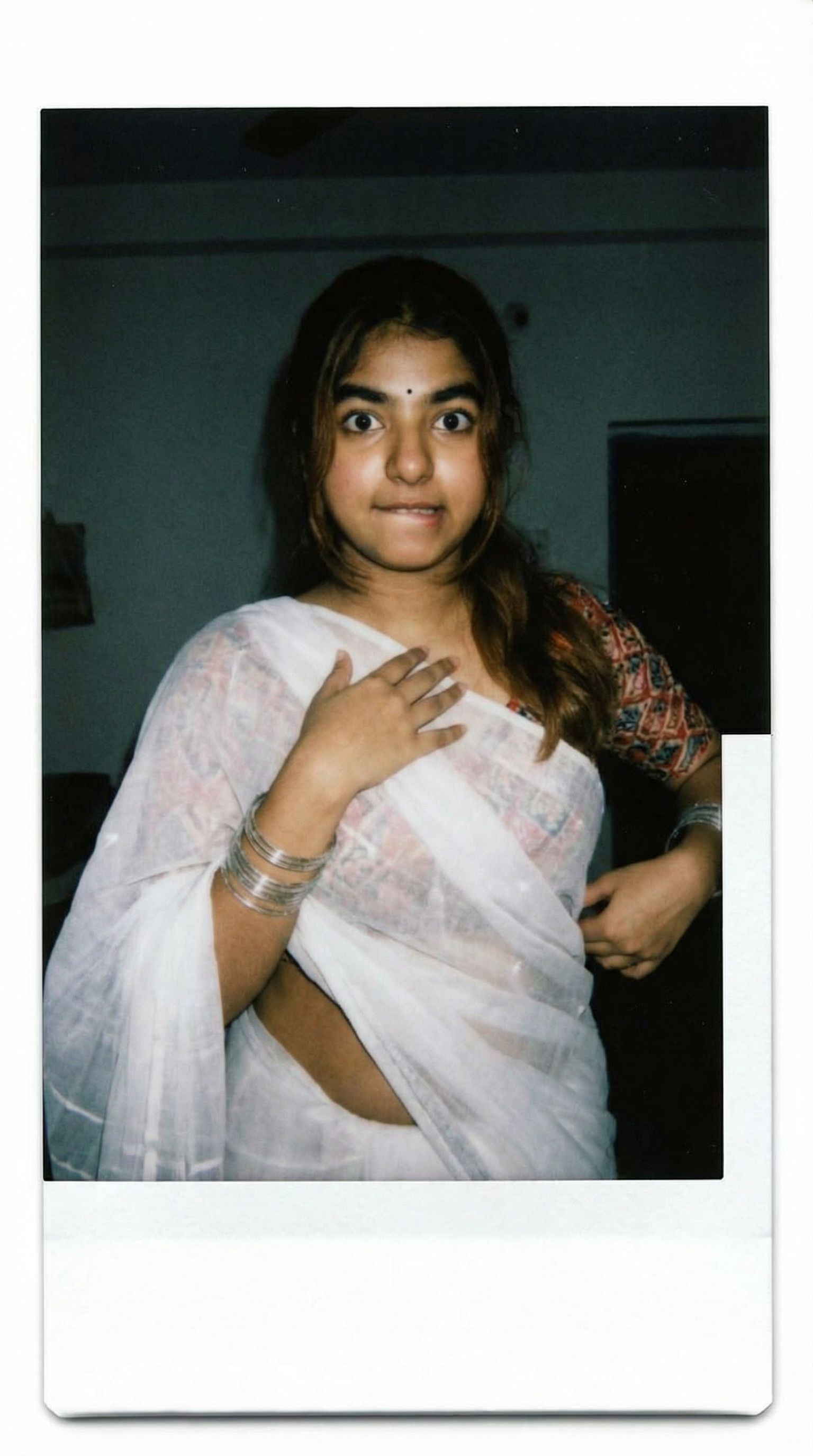 Nano Banana prompt: Shuhani shah, one hand on chest,biti...