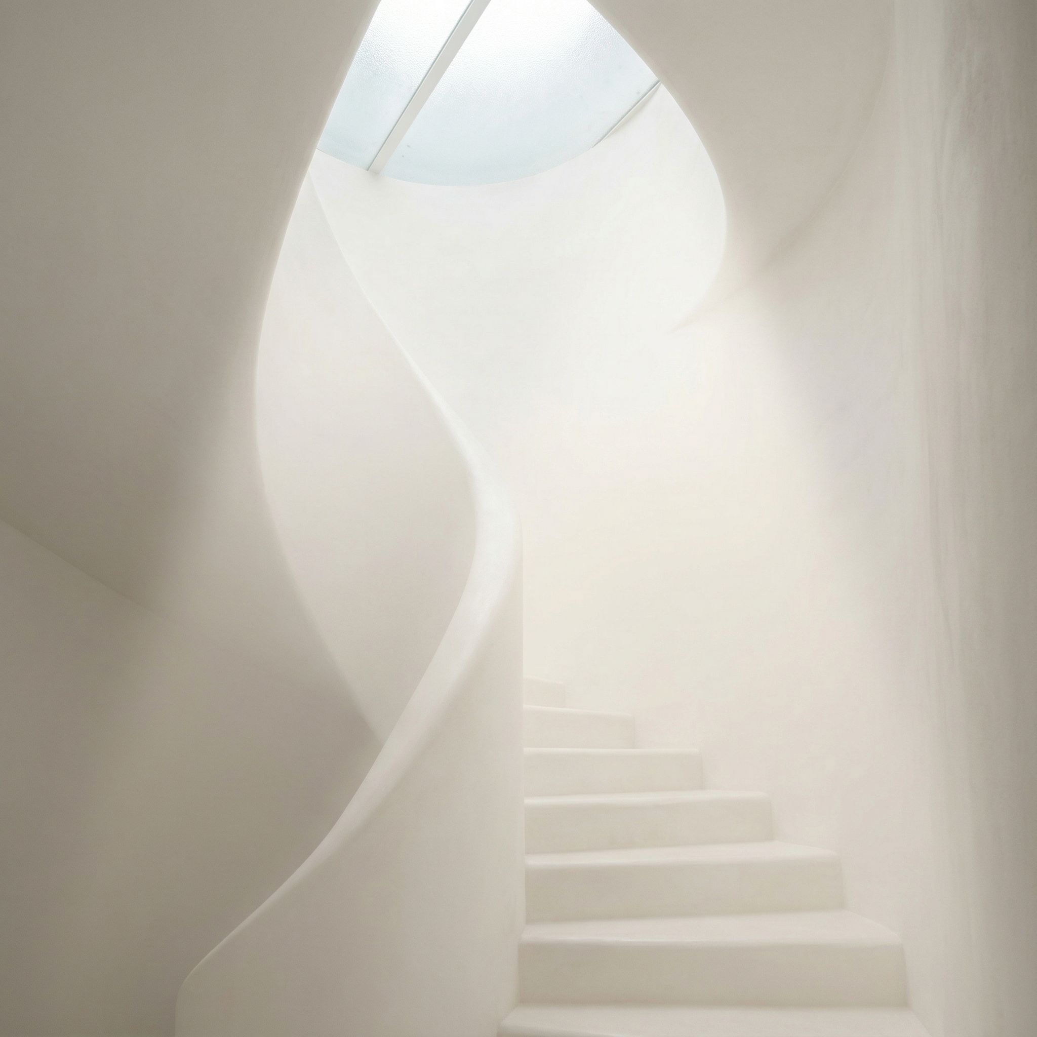 Nano Banana prompt: A white stairwell rises into near-abs...