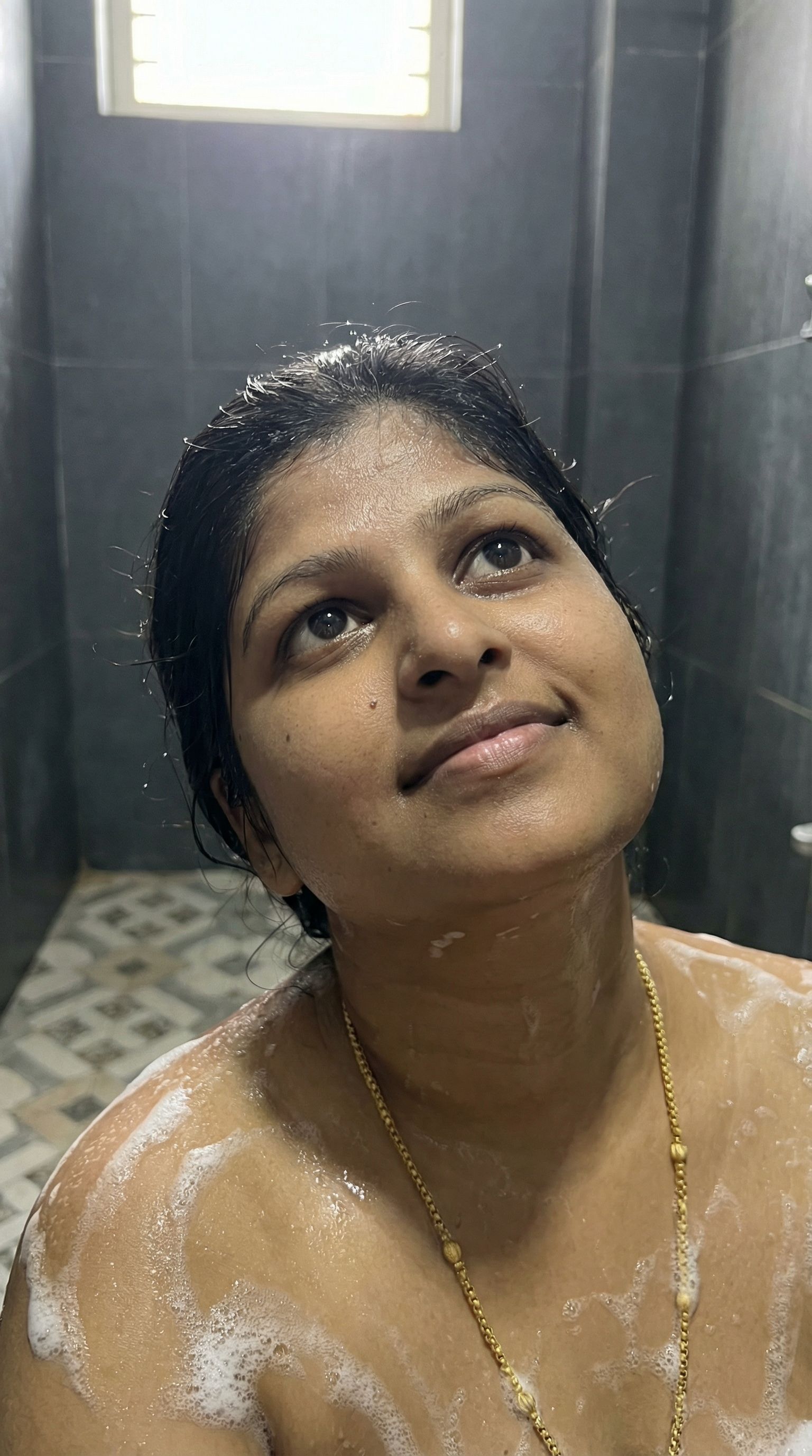 Nano Banana prompt: The image shows an adult woman in a t...