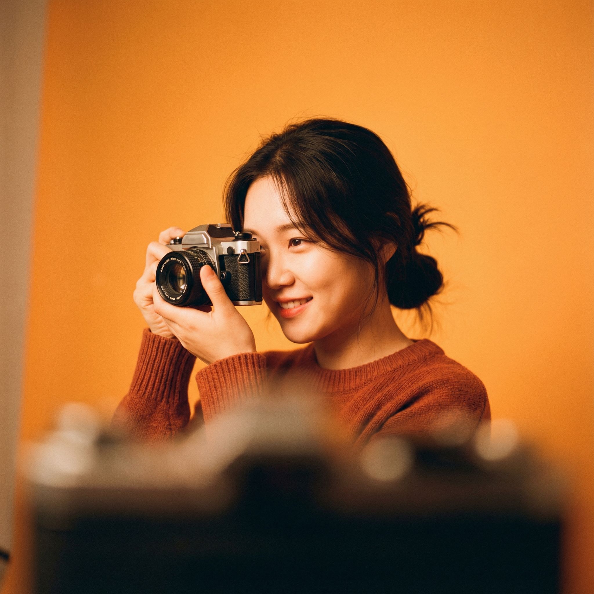 Nano Banana prompt: photography, orange hue, korean woman...